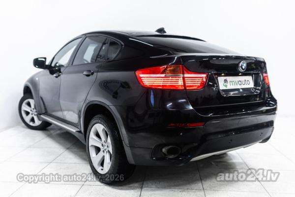 Black BMW X6 2010 in Tallinn, with an engine capacity of 3.00 L and mileage of 303 thousand km for 12990 €, photo 6 on AUTOMOTO.COM.LV