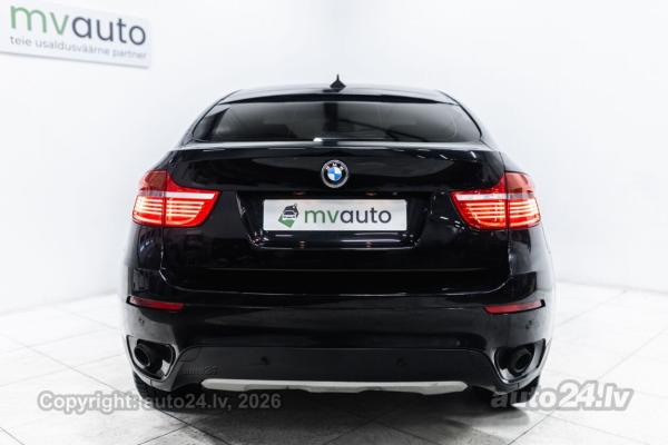 Black BMW X6 2010 in Tallinn, with an engine capacity of 3.00 L and mileage of 303 thousand km for 12990 €, photo 7 on AUTOMOTO.COM.LV