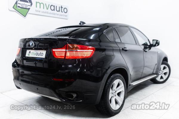 Black BMW X6 2010 in Tallinn, with an engine capacity of 3.00 L and mileage of 303 thousand km for 12990 €, photo 8 on AUTOMOTO.COM.LV