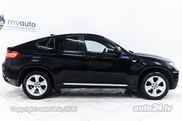 Black BMW X6 2010 in Tallinn, with an engine capacity of 3.00 L and mileage of 303 thousand km for 12990 €, photo 9 on AUTOMOTO.COM.LV