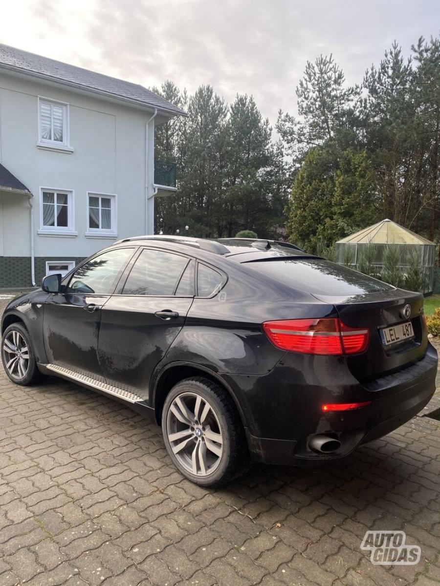 Black BMW X6 2010 in Silute, with an engine capacity of 3.00 L and mileage of 315 thousand km for 10900 €, photo 2 on AUTOMOTO.COM.LV