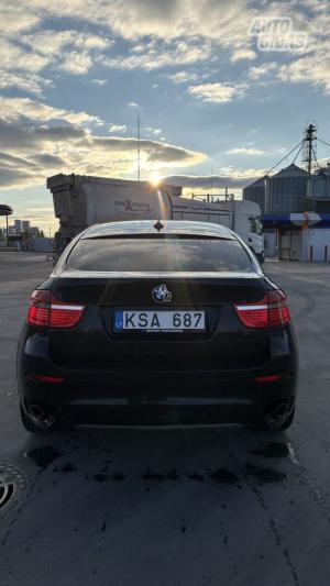 Black BMW X6 2010 in Pasvalys, with an engine capacity of 3.50 L and mileage of 374 thousand km for 12000 €, photo 4 on AUTOMOTO.COM.LV