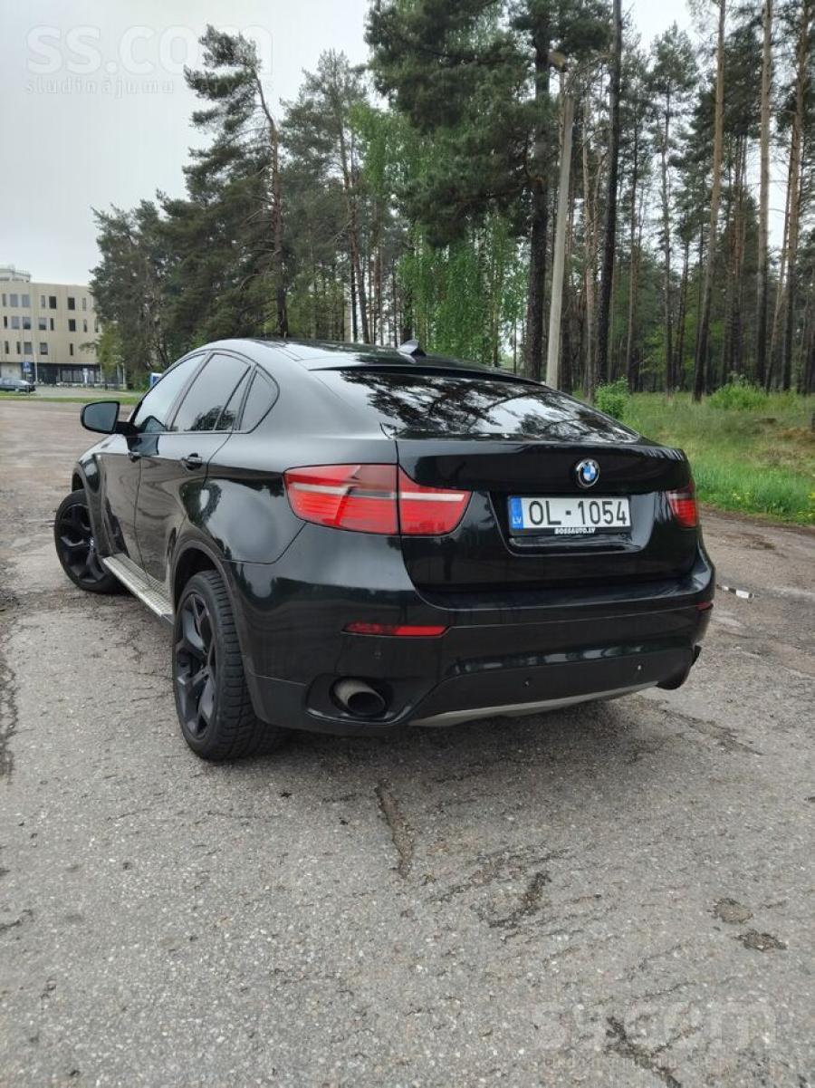 Black BMW X6 2010 in Riga, with an engine capacity of 3.00 L and mileage of 0 thousand km for 10800 €, photo 4 on AUTOMOTO.COM.LV