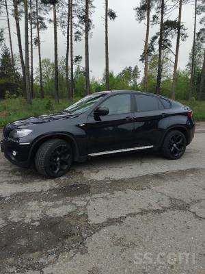 Black BMW X6 2010 in Riga, with an engine capacity of 3.00 L and mileage of 0 thousand km for 10800 €, photo 7 on AUTOMOTO.COM.LV