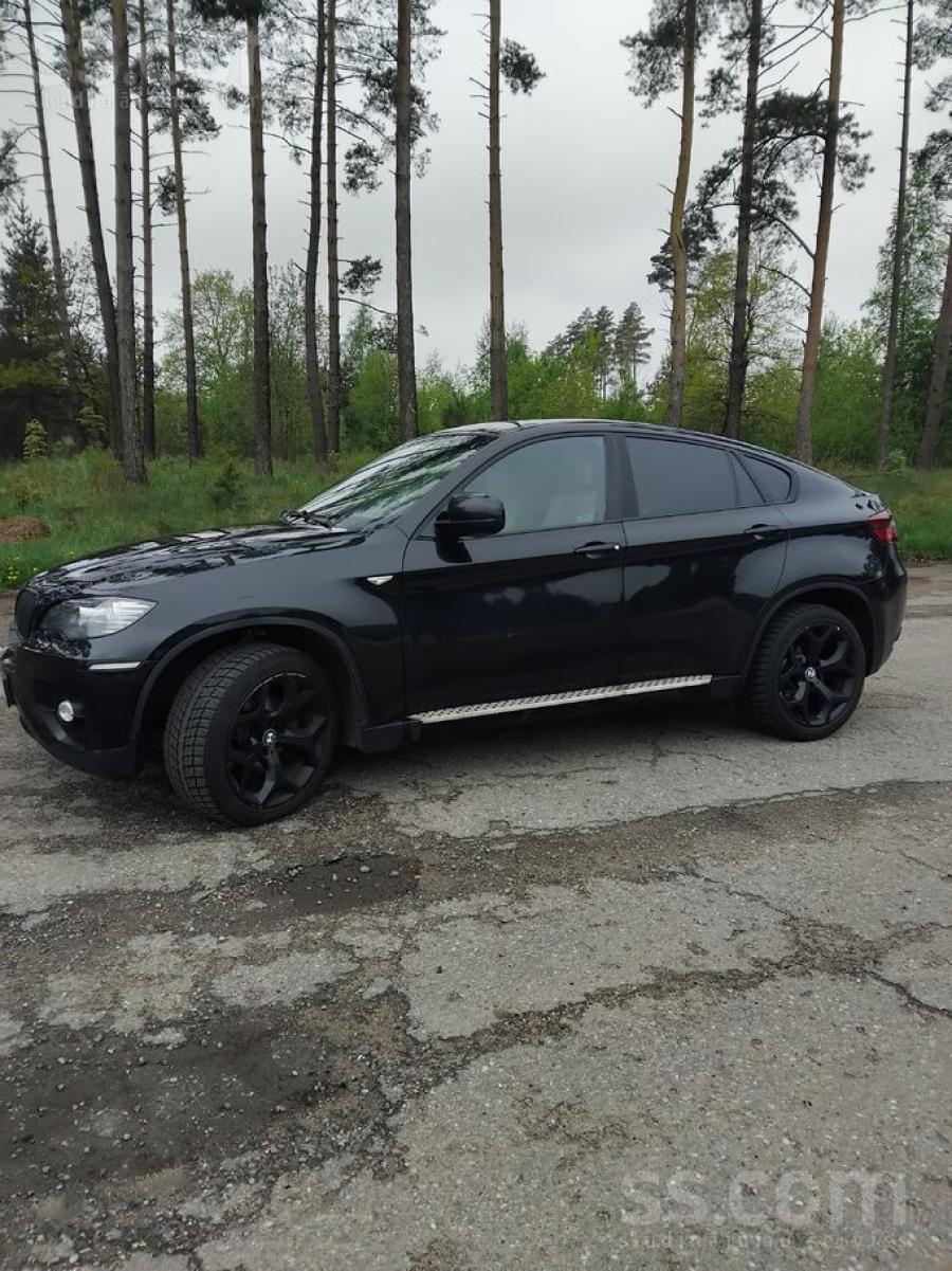 Black BMW X6 2010 in Riga, with an engine capacity of 3.00 L and mileage of 0 thousand km for 10800 €, photo 7 on AUTOMOTO.COM.LV