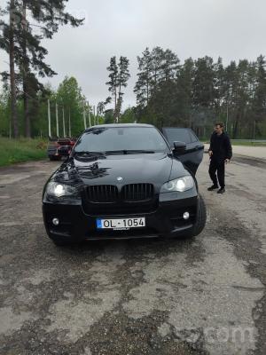 Black BMW X6 2010 in Riga, with an engine capacity of 3.00 L and mileage of 0 thousand km for 10800 €, photo 8 on AUTOMOTO.COM.LV