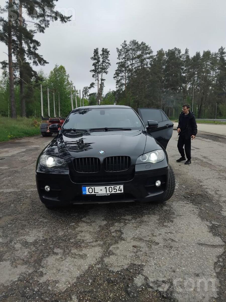 Black BMW X6 2010 in Riga, with an engine capacity of 3.00 L and mileage of 0 thousand km for 10800 €, photo 8 on AUTOMOTO.COM.LV