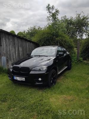 Black BMW X6 2010 in Riga, with an engine capacity of 3.00 L and mileage of 0 thousand km for 10800 €, photo 11 on AUTOMOTO.COM.LV