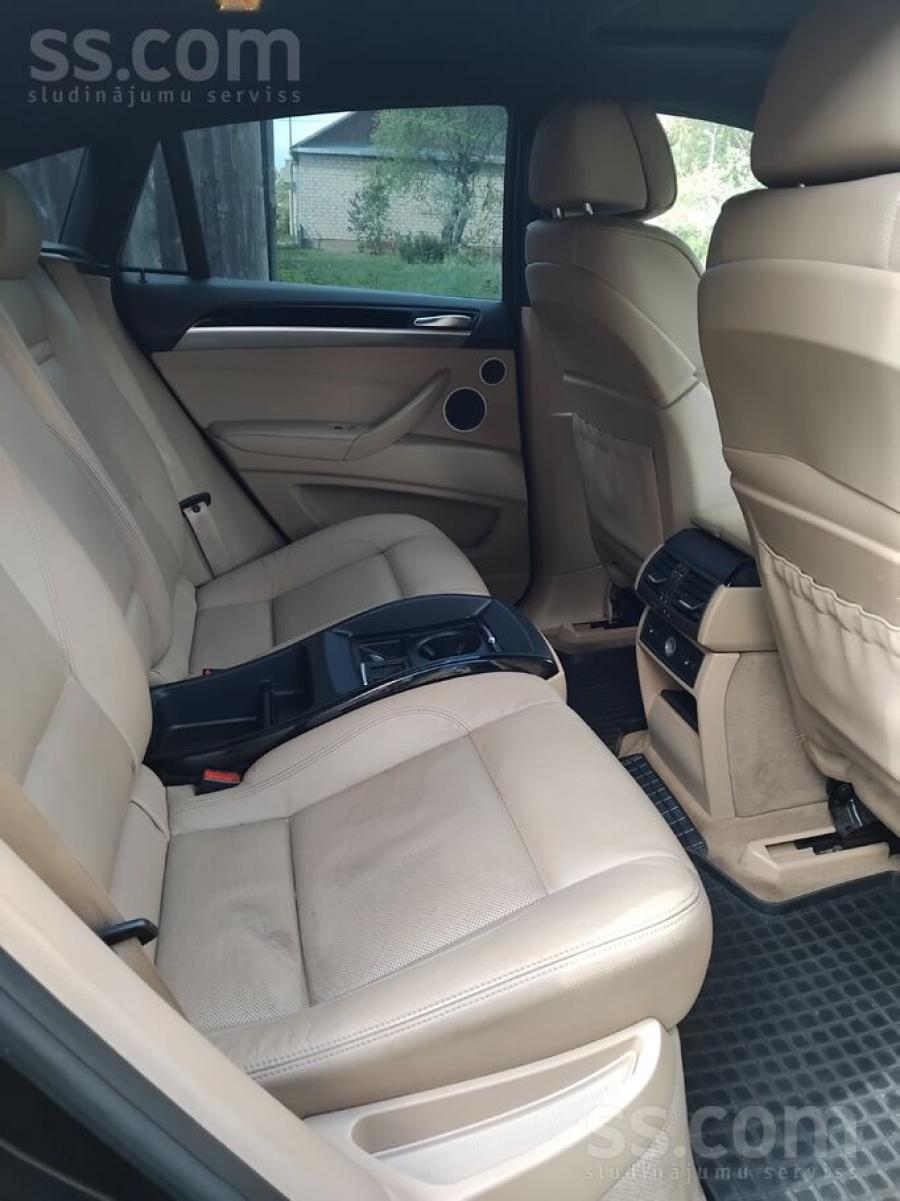 Black BMW X6 2010 in Riga, with an engine capacity of 3.00 L and mileage of 0 thousand km for 10800 €, photo 14 on AUTOMOTO.COM.LV