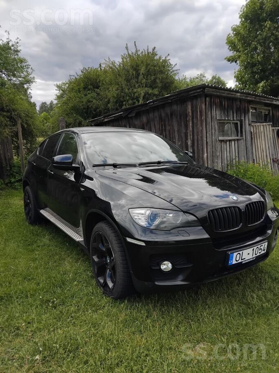 Black BMW X6 2010 in Riga, with an engine capacity of 3.00 L and mileage of 0 thousand km for 10800 €, photo 15 on AUTOMOTO.COM.LV
