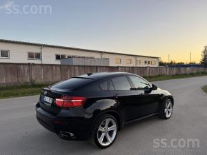 Black BMW X6 2010 in Riga, with an engine capacity of 3.00 L and mileage of 310 thousand km for 12500 €, photo 3 on AUTOMOTO.COM.LV