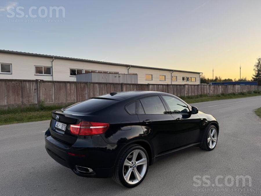Black BMW X6 2010 in Riga, with an engine capacity of 3.00 L and mileage of 310 thousand km for 12500 €, photo 3 on AUTOMOTO.COM.LV
