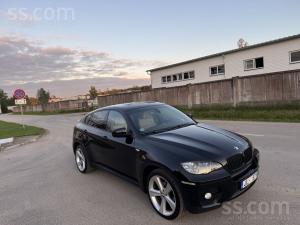 Black BMW X6 2010 in Riga, with an engine capacity of 3.00 L and mileage of 310 thousand km for 12500 €, photo 6 on AUTOMOTO.COM.LV