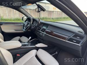 Black BMW X6 2010 in Riga, with an engine capacity of 3.00 L and mileage of 310 thousand km for 12500 €, photo 7 on AUTOMOTO.COM.LV