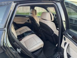 Black BMW X6 2010 in Riga, with an engine capacity of 3.00 L and mileage of 310 thousand km for 12500 €, photo 8 on AUTOMOTO.COM.LV