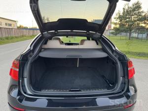 Black BMW X6 2010 in Riga, with an engine capacity of 3.00 L and mileage of 310 thousand km for 12500 €, photo 9 on AUTOMOTO.COM.LV