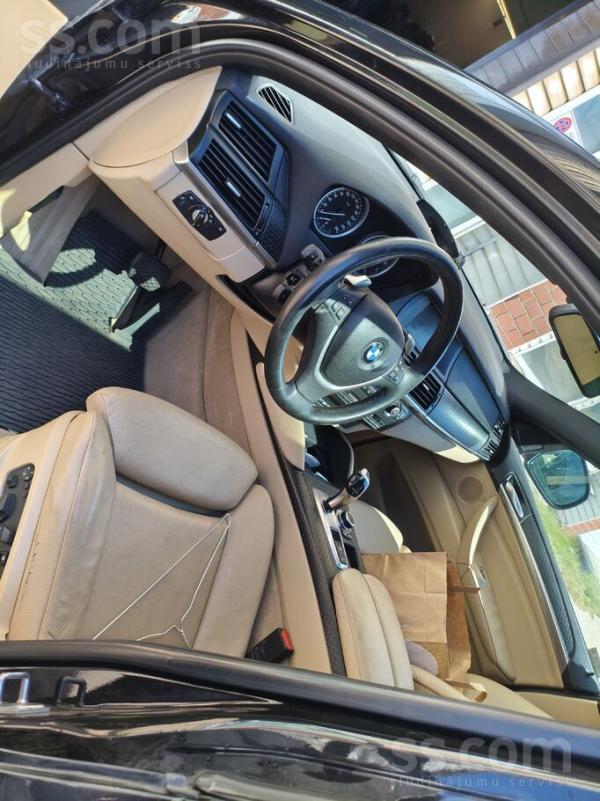 Black BMW X6 2010 in Riga, with an engine capacity of 3.00 L and mileage of 214 thousand km for 6000 €, photo 6 on AUTOMOTO.COM.LV