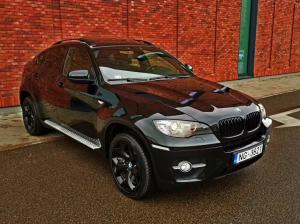 Black BMW X6 2010 in Riga, with an engine capacity of 3.00 L and mileage of 239 thousand km for 18900 €, photo  on AUTOMOTO.COM.LV