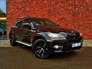 Black BMW X6 2010 in Riga, with an engine capacity of 3.00 L and mileage of 239 thousand km for 18900 €, photo 3 on AUTOMOTO.COM.LV