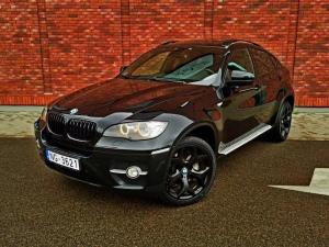 Black BMW X6 2010 in Riga, with an engine capacity of 3.00 L and mileage of 239 thousand km for 18900 €, photo 5 on AUTOMOTO.COM.LV
