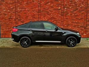 Black BMW X6 2010 in Riga, with an engine capacity of 3.00 L and mileage of 239 thousand km for 18900 €, photo 6 on AUTOMOTO.COM.LV