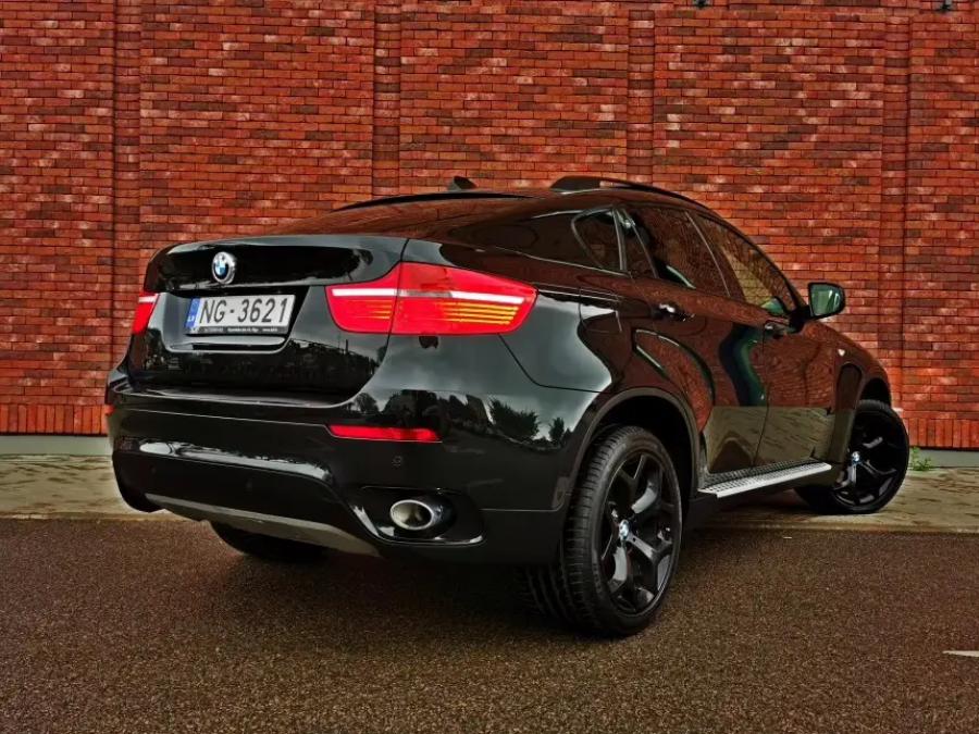 Black BMW X6 2010 in Riga, with an engine capacity of 3.00 L and mileage of 239 thousand km for 18900 €, photo 8 on AUTOMOTO.COM.LV