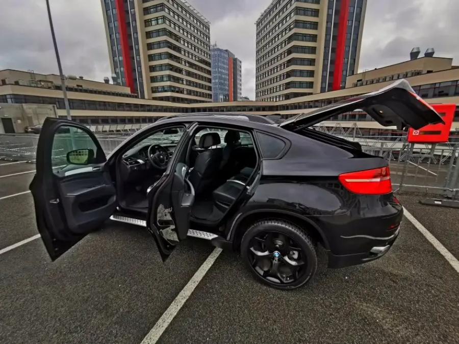 Black BMW X6 2010 in Riga, with an engine capacity of 3.00 L and mileage of 239 thousand km for 18900 €, photo 11 on AUTOMOTO.COM.LV