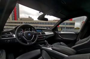 Black BMW X6 2010 in Riga, with an engine capacity of 3.00 L and mileage of 239 thousand km for 18900 €, photo 12 on AUTOMOTO.COM.LV
