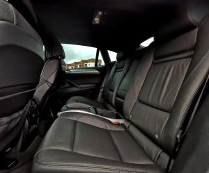 Black BMW X6 2010 in Riga, with an engine capacity of 3.00 L and mileage of 239 thousand km for 18900 €, photo 15 on AUTOMOTO.COM.LV
