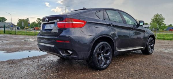 Black BMW X6 2010 in Riga, with an engine capacity of 3.00 L and mileage of 164 thousand km for 14550 €, photo 5 on AUTOMOTO.COM.LV