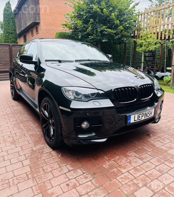 Black BMW X6 2010 in Riga, with an engine capacity of 3.00 L and mileage of 159 thousand km for 17500 €, photo 4 on AUTOMOTO.COM.LV