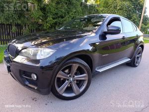 Black BMW X6 2010 in Riga, with an engine capacity of 3.00 L and mileage of 315 thousand km for 9990 €, photo  on AUTOMOTO.COM.LV