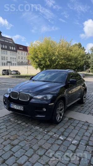 Black BMW X6 2010 in Riga, with an engine capacity of 3.00 L and mileage of 474 thousand km for 9800 €, photo 7 on AUTOMOTO.COM.LV