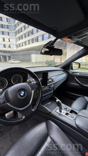 Black BMW X6 2010 in Riga, with an engine capacity of 3.00 L and mileage of 474 thousand km for 9800 €, photo 11 on AUTOMOTO.COM.LV