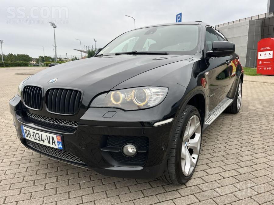Black BMW X6 2011 in Riga, with an engine capacity of 3.00 L and mileage of 266 thousand km for 13950 €, photo 2 on AUTOMOTO.COM.LV