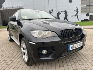 Black BMW X6 2011 in Riga, with an engine capacity of 3.00 L and mileage of 266 thousand km for 13950 €, photo 3 on AUTOMOTO.COM.LV