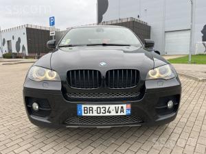 Black BMW X6 2011 in Riga, with an engine capacity of 3.00 L and mileage of 266 thousand km for 13950 €, photo 4 on AUTOMOTO.COM.LV
