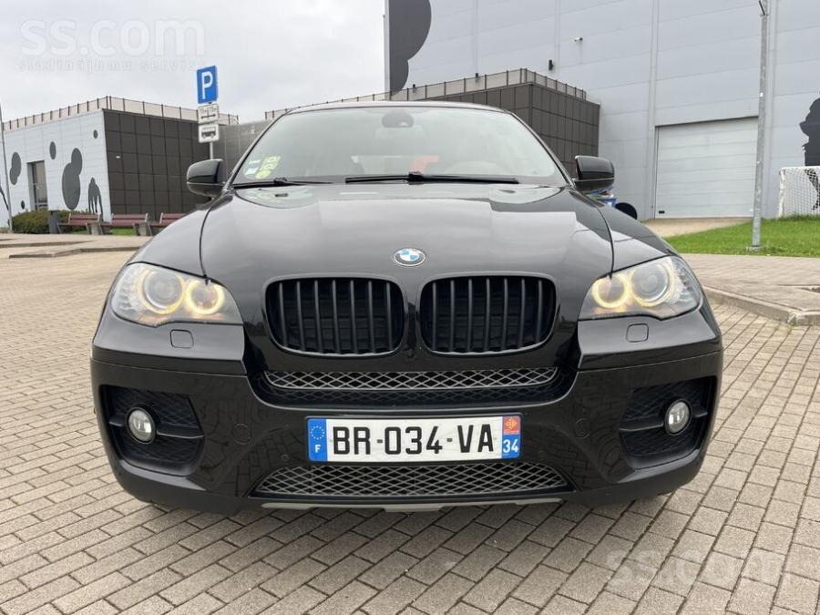 Black BMW X6 2011 in Riga, with an engine capacity of 3.00 L and mileage of 266 thousand km for 13950 €, photo 4 on AUTOMOTO.COM.LV