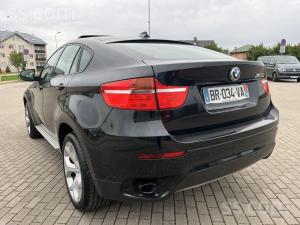 Black BMW X6 2011 in Riga, with an engine capacity of 3.00 L and mileage of 266 thousand km for 13950 €, photo 5 on AUTOMOTO.COM.LV