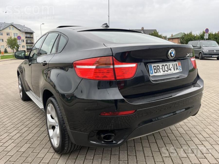 Black BMW X6 2011 in Riga, with an engine capacity of 3.00 L and mileage of 266 thousand km for 13950 €, photo 5 on AUTOMOTO.COM.LV
