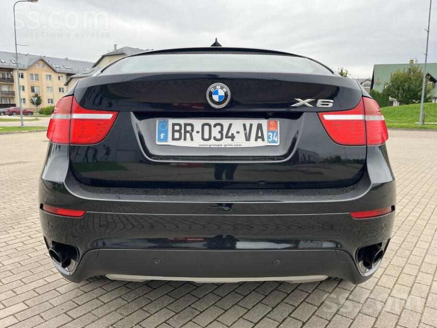 Black BMW X6 2011 in Riga, with an engine capacity of 3.00 L and mileage of 266 thousand km for 13950 €, photo 6 on AUTOMOTO.COM.LV