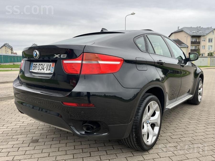 Black BMW X6 2011 in Riga, with an engine capacity of 3.00 L and mileage of 266 thousand km for 13950 €, photo 7 on AUTOMOTO.COM.LV