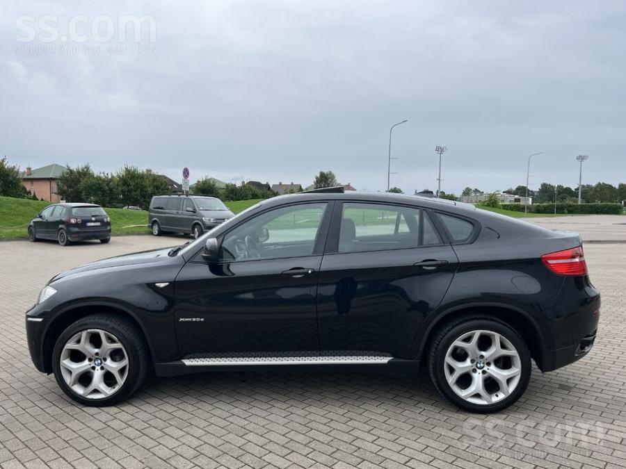Black BMW X6 2011 in Riga, with an engine capacity of 3.00 L and mileage of 266 thousand km for 13950 €, photo 8 on AUTOMOTO.COM.LV