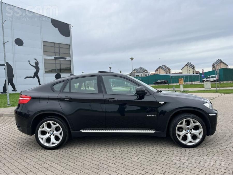Black BMW X6 2011 in Riga, with an engine capacity of 3.00 L and mileage of 266 thousand km for 13950 €, photo 9 on AUTOMOTO.COM.LV