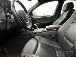Black BMW X6 2011 in Riga, with an engine capacity of 3.00 L and mileage of 266 thousand km for 13950 €, photo 11 on AUTOMOTO.COM.LV