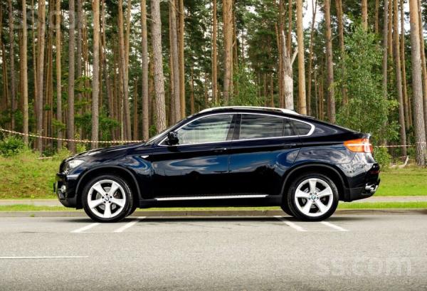 Black BMW X6 2011 in Riga, with an engine capacity of 3.00 L and mileage of 250 thousand km for 13190 €, photo 4 on AUTOMOTO.COM.LV