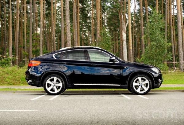 Black BMW X6 2011 in Riga, with an engine capacity of 3.00 L and mileage of 250 thousand km for 13190 €, photo 8 on AUTOMOTO.COM.LV