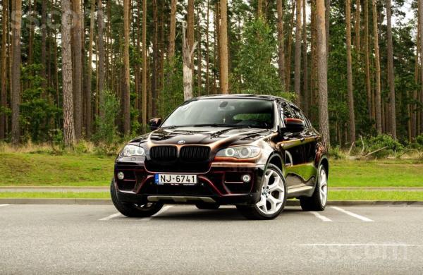 Black BMW X6 2011 in Riga, with an engine capacity of 3.00 L and mileage of 230 thousand km for 12190 €, photo 1 on AUTOMOTO.COM.LV