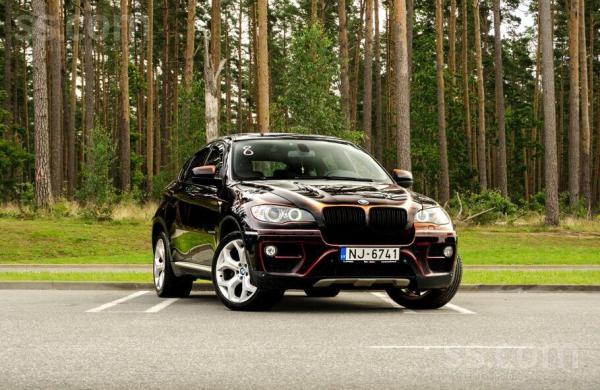 Black BMW X6 2011 in Riga, with an engine capacity of 3.00 L and mileage of 230 thousand km for 12190 €, photo 2 on AUTOMOTO.COM.LV