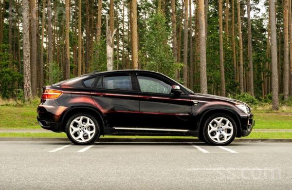Black BMW X6 2011 in Riga, with an engine capacity of 3.00 L and mileage of 230 thousand km for 12190 €, photo 8 on AUTOMOTO.COM.LV